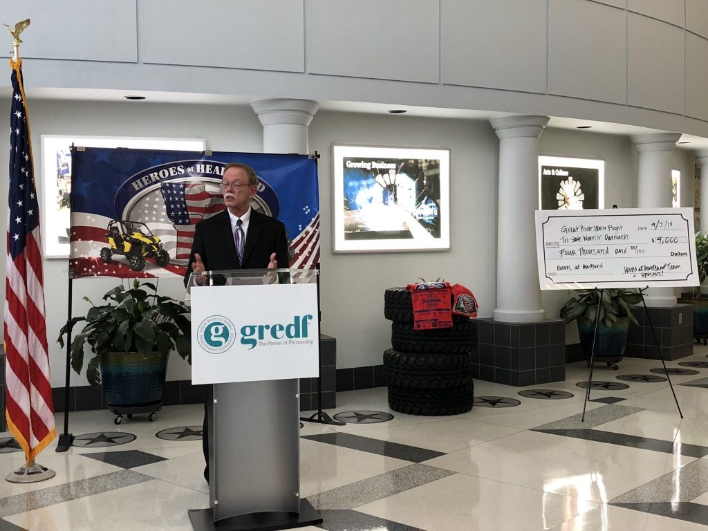 Heroes Ron Check | Great River Economic Develpment